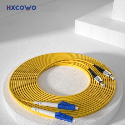 China Armored Fiber Cable Patch HXCOWO OM4 LC UPC to FC Duplex Multimode Fiber Optic Cable for sale