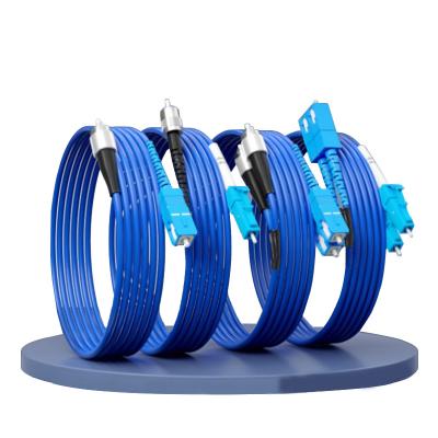 China Fiber Optic Patch Cord LC UPC/LC UPC 2.0mm PVC OFNR 9/125 Single Mode Fiber Optic Cable Patch for sale