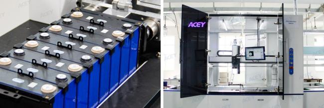 Close-up view of battery cell processing station