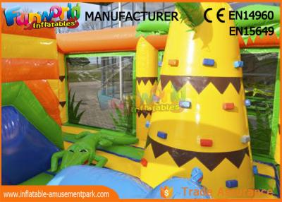 China durable Inflatable Amusement Park Climbing Wall Jungle Bouncer With Slide 6.8 * 7.2 m for sale