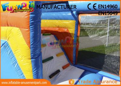 China durable Inflatable Amusement Park Climbing Wall Jungle Bouncer With Slide 6.8 * 7.2 m for sale