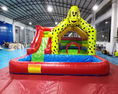 China Yellow Dog Bounce House Tarpaulin Inflatable Water Slide With Pool for sale
