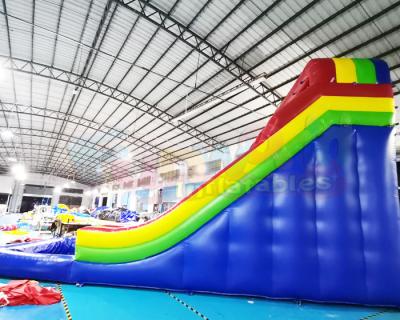 China Playground Outdoor Inflatable Water Slides Double Side Jumping Bouncer for sale