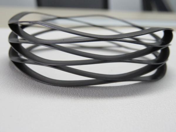 Quality 50CrVA Steel Wave Spring with Fine Punching Process for Compression Load for sale