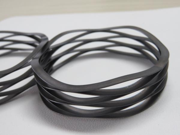 Quality 50CrVA Steel Wave Spring with Fine Punching Process for Compression Load for sale