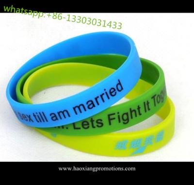 China colorful promotional gifts,swirl debossed silicone bracelet/silicone wristband for sale