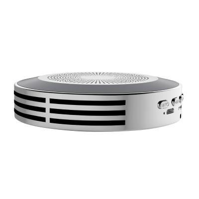 China Usb Connectivity Portable Bluetooth Speaker with Built in Wireless Charging Station for sale