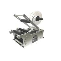 China Hand Pressed Round Bottle Labeling Machine Semi Automatic 220V for sale