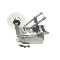 China Hand Pressed Round Bottle Labeling Machine Semi Automatic 220V for sale