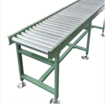 China Carbon Steel Roller Conveyor Assembly Line Loading And Unloading for sale