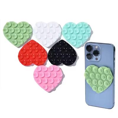 China Explosive Wear-Resistant Silicone Double-Sided Suction Cup Phone Stand Multi-Style Design Desk Organizer for Mobile Phone Fixed for sale