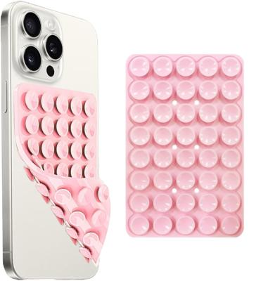 China Portable 24 Sucker Double Sided Acrylic Adhesive Silicone Mobile Phone Holder Low Noise Soft Selfie Case Anti-Shock Removable for sale