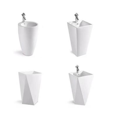 China Integrated One Piece Ceramic Pedestal Sink Floor Mounted Standing for Hotel Homestay Washstand for sale