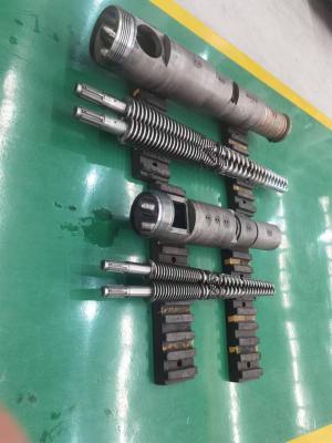China Conical Twin Screw and Barrel with 0.5mm to 0.8mm Nitriding Depth HRC58-62 Hardness and 3kW Screw Cooling Power for Plastic Extrusion for sale