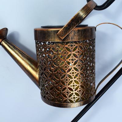 Cina Lampada a pavimento a scaldabagno a caldaia di ferro solare creativa per paesaggi da giardino all'aperto in vendita