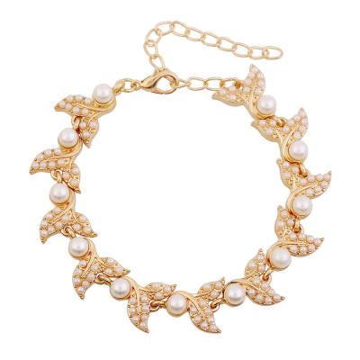 China Ladies's beautiful jewelry 18k gold plated chain bracelet leaves shaped pearl bracelet for sale