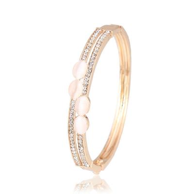China Hot trendy 18k gold plated cat's eye bangles women fashion bracelet jewelry wholesale for sale