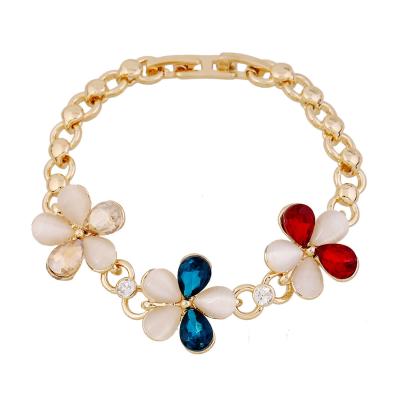 China Latest Tpquality eco-friendly wholesale flower gold chain bracelet/drop crystal bracelet for sale
