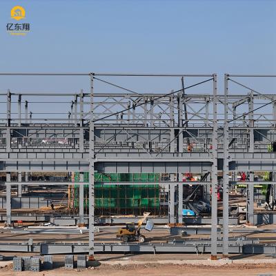 China Modern Steel Structure Building with Bolt Connection and Roller Shut Door for sale