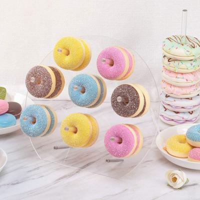Cina Bello supporto acrilico a forma ovale POS supporto acrilico per ciambelle da dessert in vendita