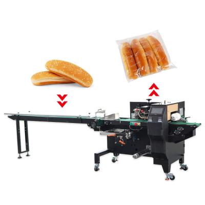 China Multi-Function Fully Automatic High Efficiency Wrapping Labeling Frozen Burger Cookie Food Sandwich Paper Pillow Machine for sale