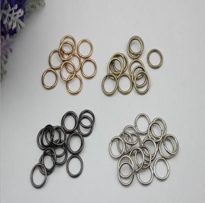 China Guangzhou factory sales bag parts and accessories gold 10 mm round metal wire iron buckles for sale
