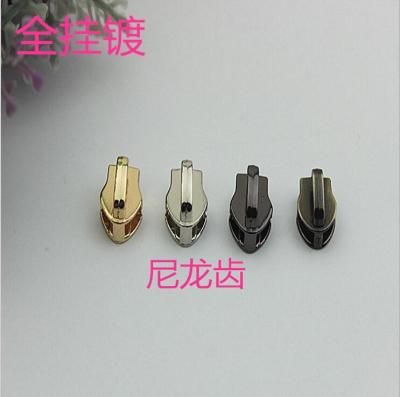 China High end zinc alloy light gold nylon teeth zipper 5# zipper slider for bags for sale
