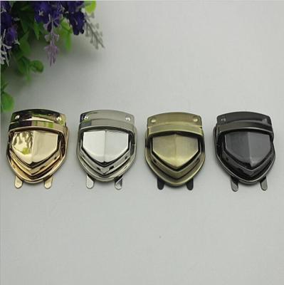 China Custom various color zinc alloy handbag metal push locks wholesale for sale
