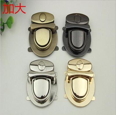 China Fashionable handbag hardware zinc alloy nickel color metal push lock for bags for sale