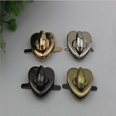 China New fashion zinc alloy gold color metal bag hardware twist lock with nickel free for sale