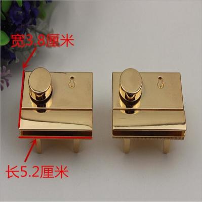 China Top quality light gold handbag zinc alloy turn locks and hardware for lady sling leather bag for sale