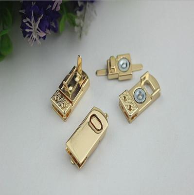 China Custom zinc alloy gold metal decorative handbag press lock for purse for sale