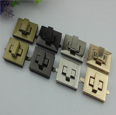 China Factory Price Nickle Free Plating Gold Zinc Alloy Rectangle Metal Twist Turn Lock For Handbags for sale