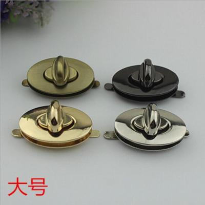 China Shiny gold bag hardware fittings fashion zinc alloy twist turn lock for purse for sale