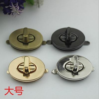 China Guangzhou bag oval shape hardware zinc alloy silver color metal twist turn lock for purse for sale