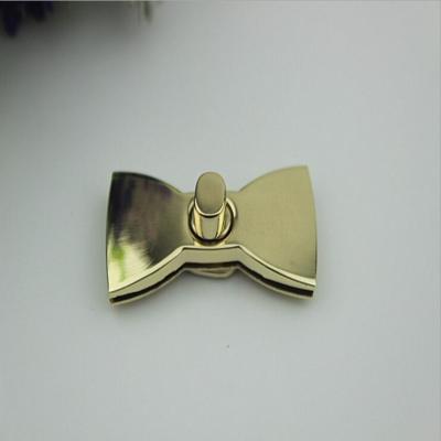 China Simple custom shiny gold butterfly bow pattern zinc alloy fashion locks for purse for sale