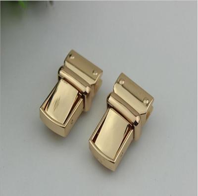 China Fashion bag make accessories light gold metal press locks for handbags for sale