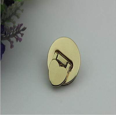 China New style shiny gold round shape heart accessories metal turn lock for handbag for sale