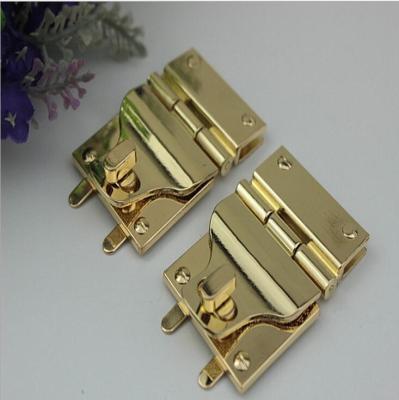 China Unique design zinc alloy gold metal bag hardware twist turn lock for sale