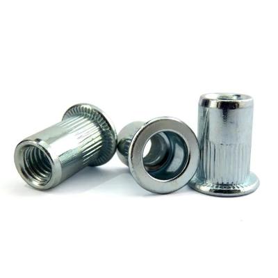 China Flat Head Blind Nut Inserts Bright Zinc Plated M6 Rivet Nut Corrosion Resistant for sale