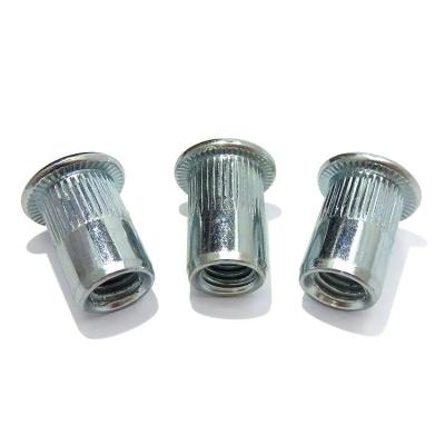 China Flat Head Blind Nut Inserts Bright Zinc Plated M6 Rivet Nut Corrosion Resistant for sale