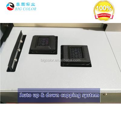 China Impressora de tela plana UV de duas cabeças de tamanho pequeno para impressão de capa e garrafa móvel de alta velocidade à venda