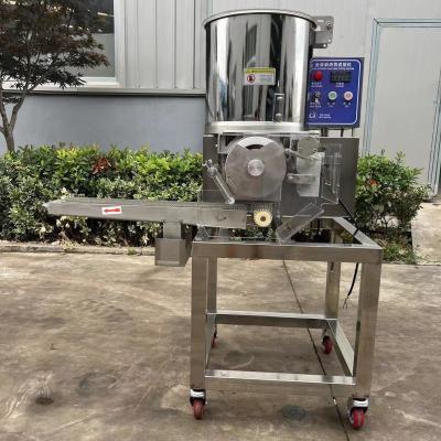 China Meatball maken machine met 380V Spanning aangepast Meatball Maker Rolling Machine Te koop