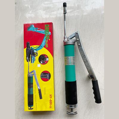 中国 Green Dual Piston Grease Gun Lever Action Grease Gun Set With 6in Hard Metal Extension Tube Coupler 販売のため