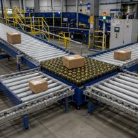 China Adjustable Sorting Speed Servo Driven Wheel Sorter for Parcel Handling Automation for sale