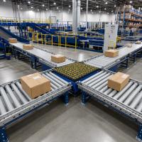 China Adjustable Sorting Speed Servo Driven Wheel Sorter for Parcel Handling Automation for sale