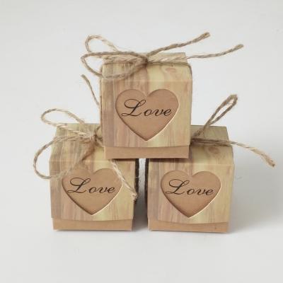 Cina Piastrellato verso l'esterno il laser di carta del grano di legno tagli le scatole di favore di nozze in vendita