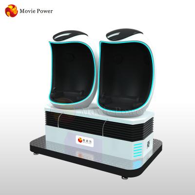 中国 二重座席が付いている流行の電気9D VRの映画館/バーチャル リアリティの卵の動きの椅子 販売のため