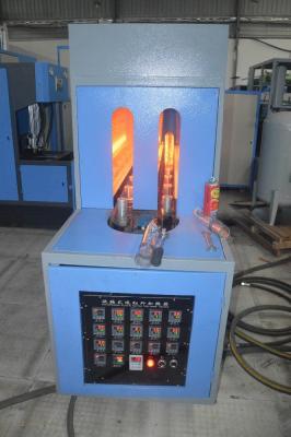 China Infared Heater Two Cavity PET Bottle Blowing Machine for Smooth Bottle Production for sale