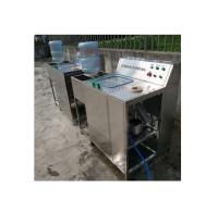 China Easy to Operate Automatic 5 Gallon Bottle De-Capping and Washing Machine for sale